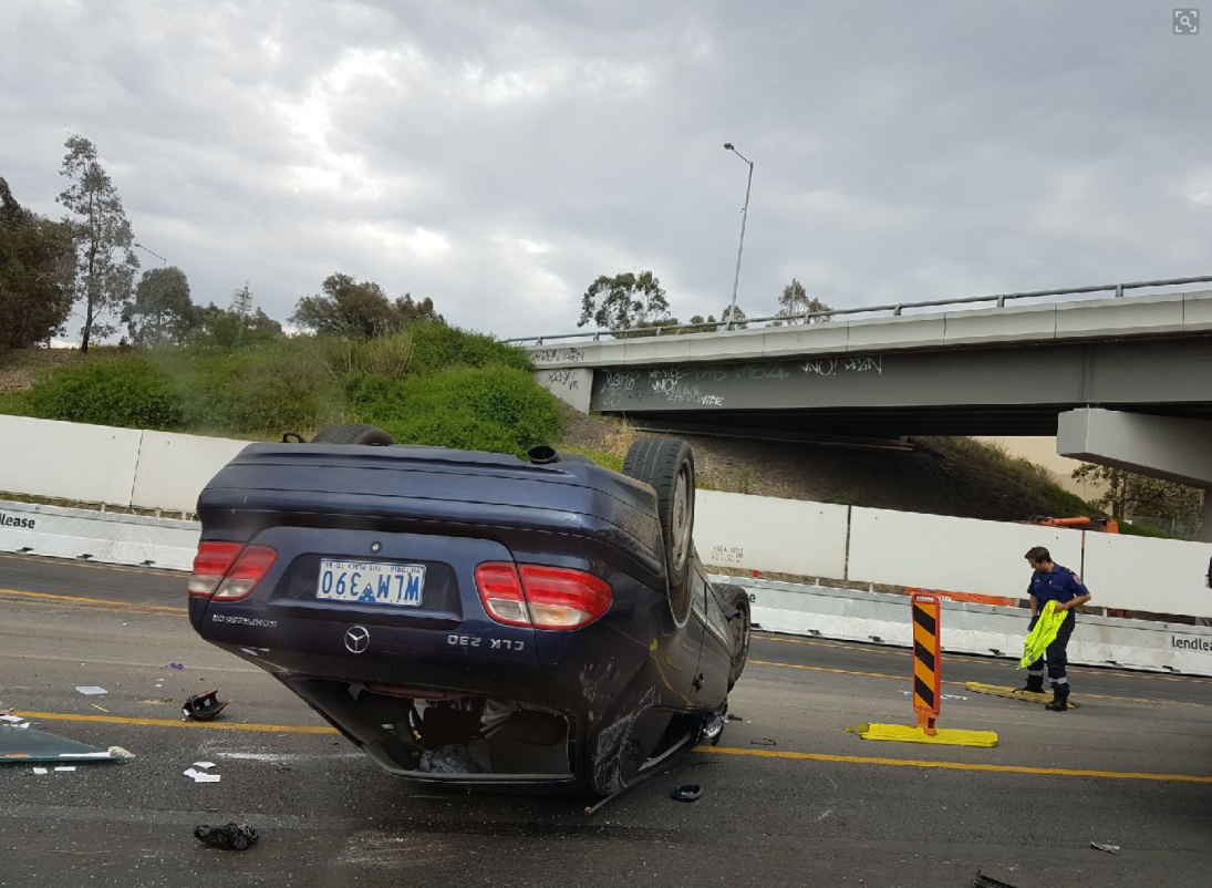 Car roll-over on Tullamarine Freeway