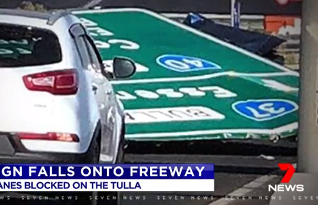 Massive road sign falls, crushing car on Tullamarine Freeway