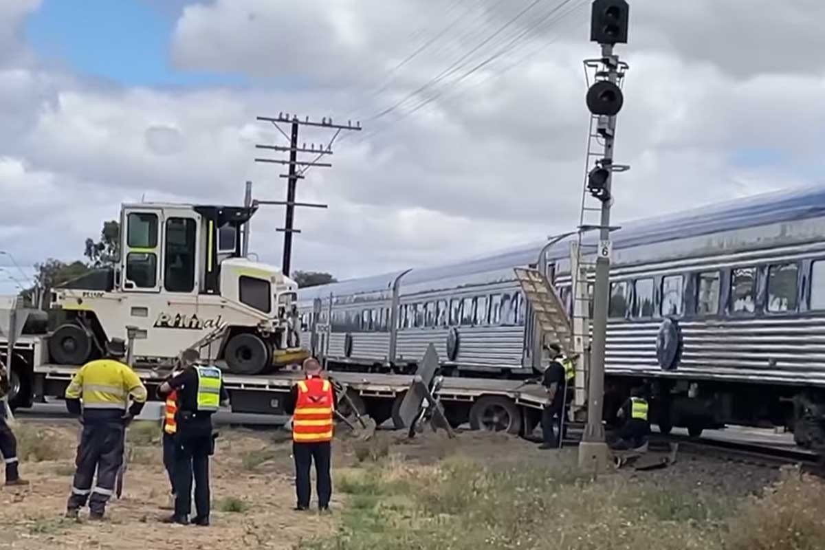 Overland train clips truck at level crossing, leaving at least one ...