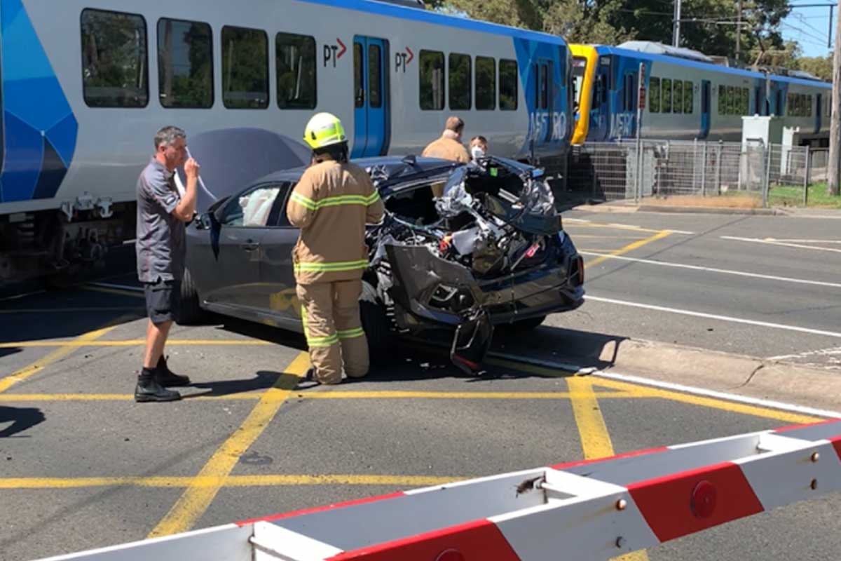 Dramatic scenes as train smashes into car stuck on level crossing ...