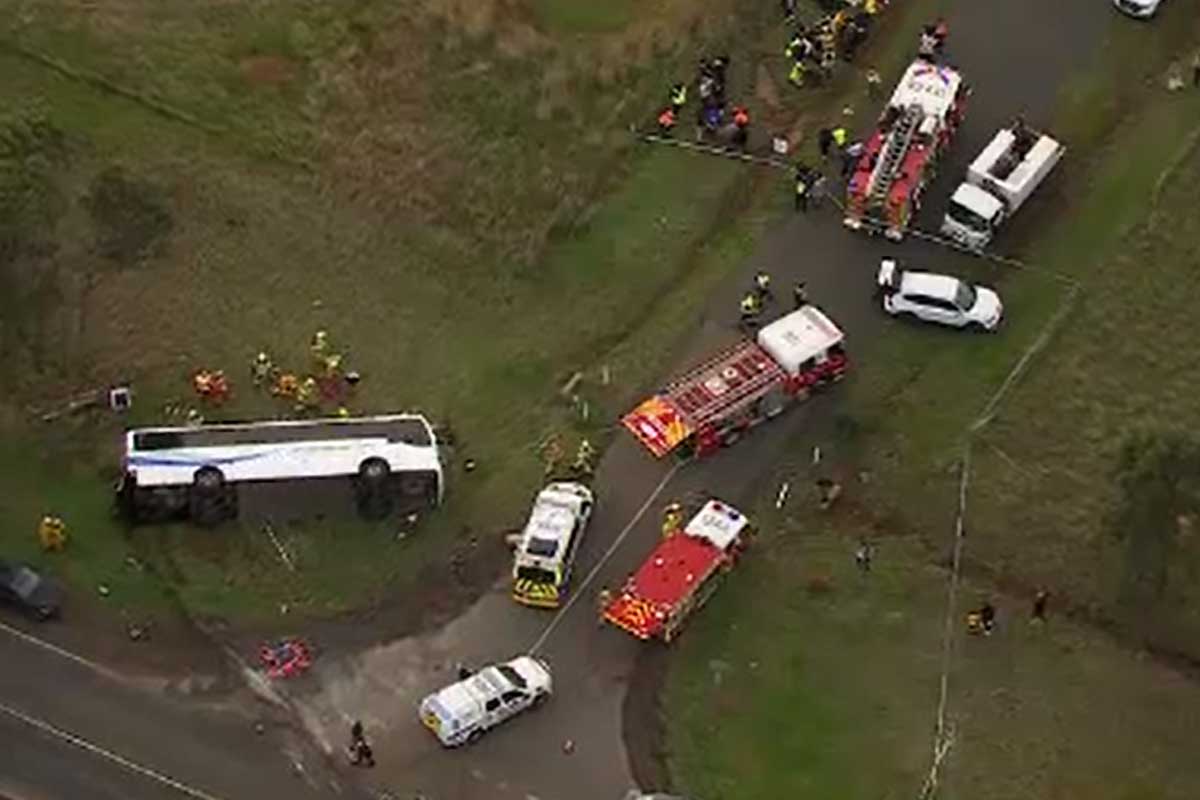 Truck driver charged after horror school bus crash