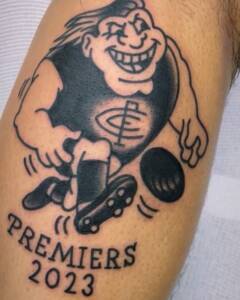 Carlton fan goes early crow with premiership tattoo!