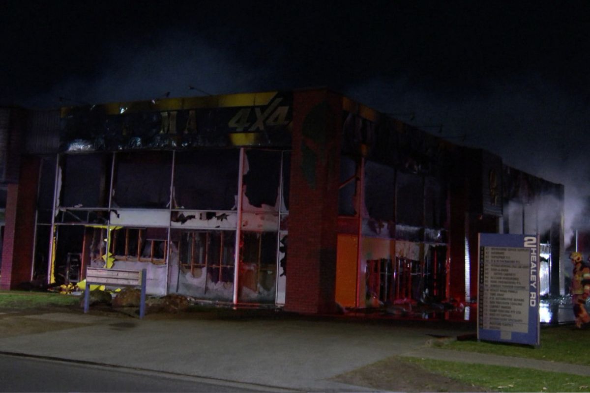 'It's pretty bad': Dozens of firefighters contain large factory fire in ...